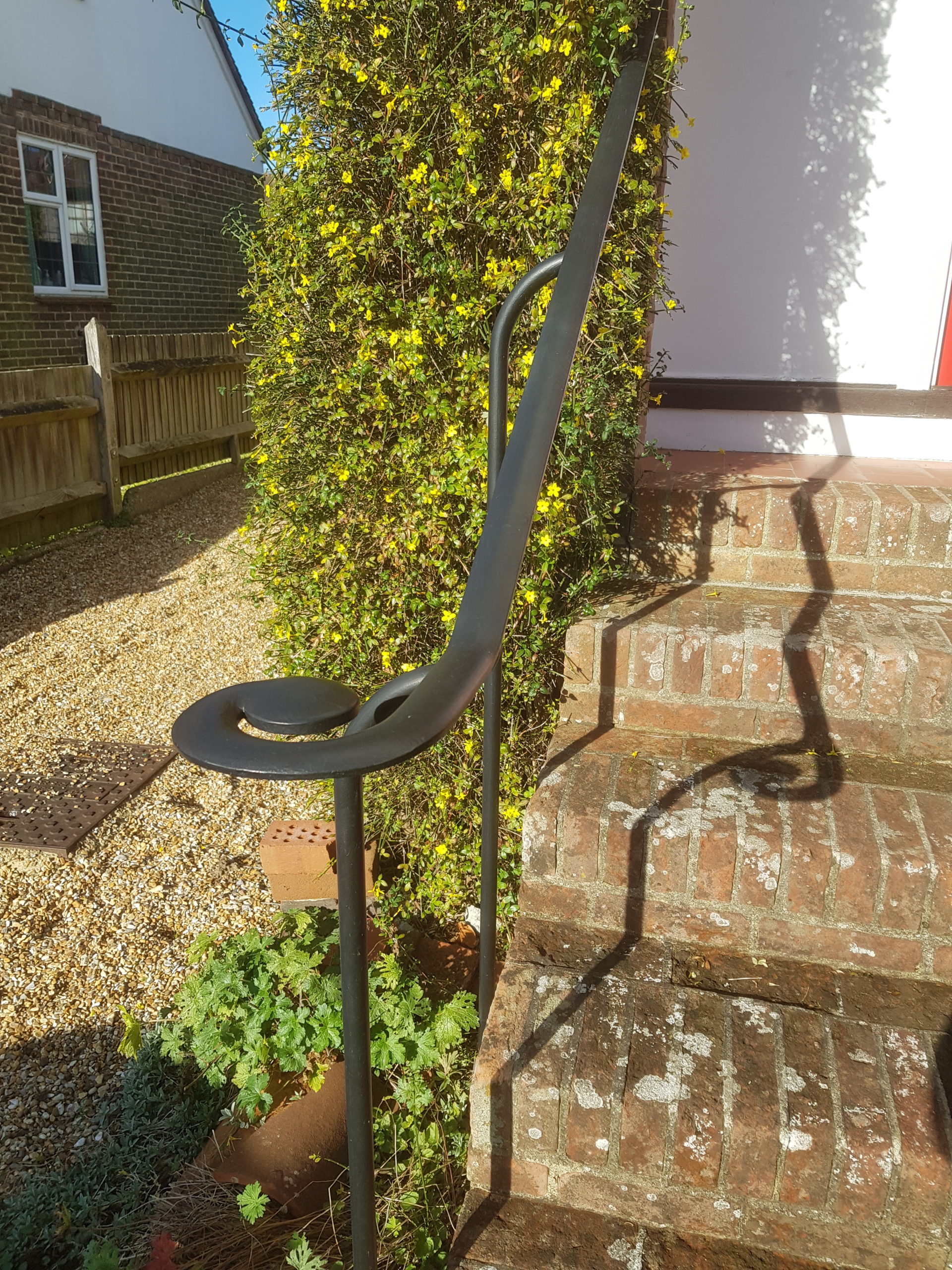Curved flat topped stair hand rail - Petersfield Forge